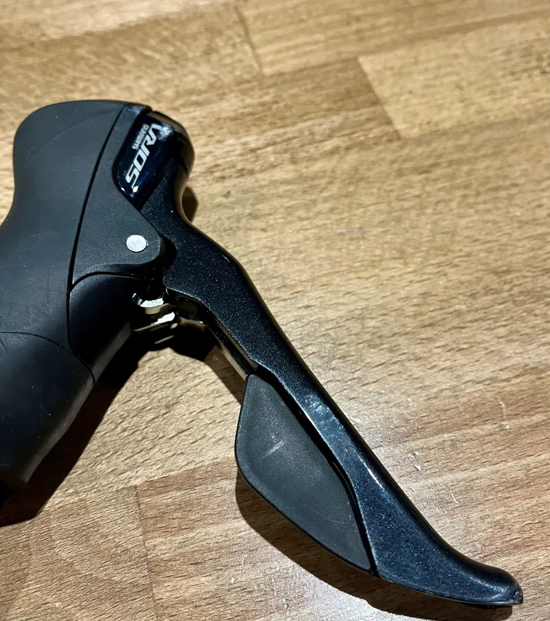 Shimano Sora 3x9 speed STI mechanical levers.